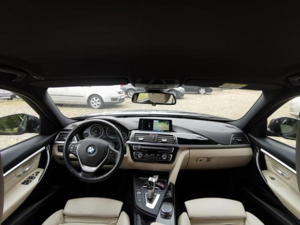 Black BMW 320 2018 in Riga, with an engine capacity of 2.00 L and mileage of 223 thousand km for 13900 €, photo 6 on AUTOMOTO.COM.LV