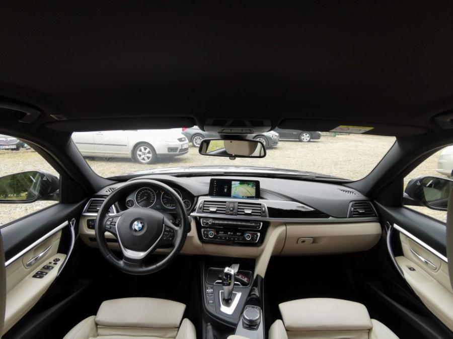 Black BMW 320 2018 in Riga, with an engine capacity of 2.00 L and mileage of 223 thousand km for 13900 €, photo 7 on AUTOMOTO.COM.LV