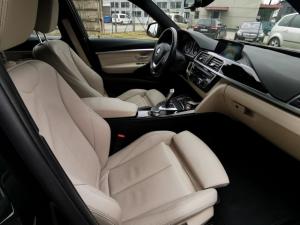 Black BMW 320 2018 in Riga, with an engine capacity of 2.00 L and mileage of 223 thousand km for 13900 €, photo 9 on AUTOMOTO.COM.LV