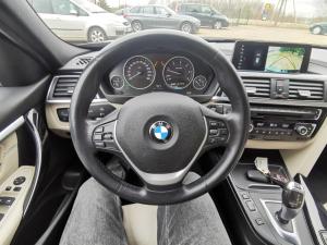Black BMW 320 2018 in Riga, with an engine capacity of 2.00 L and mileage of 223 thousand km for 13900 €, photo 12 on AUTOMOTO.COM.LV