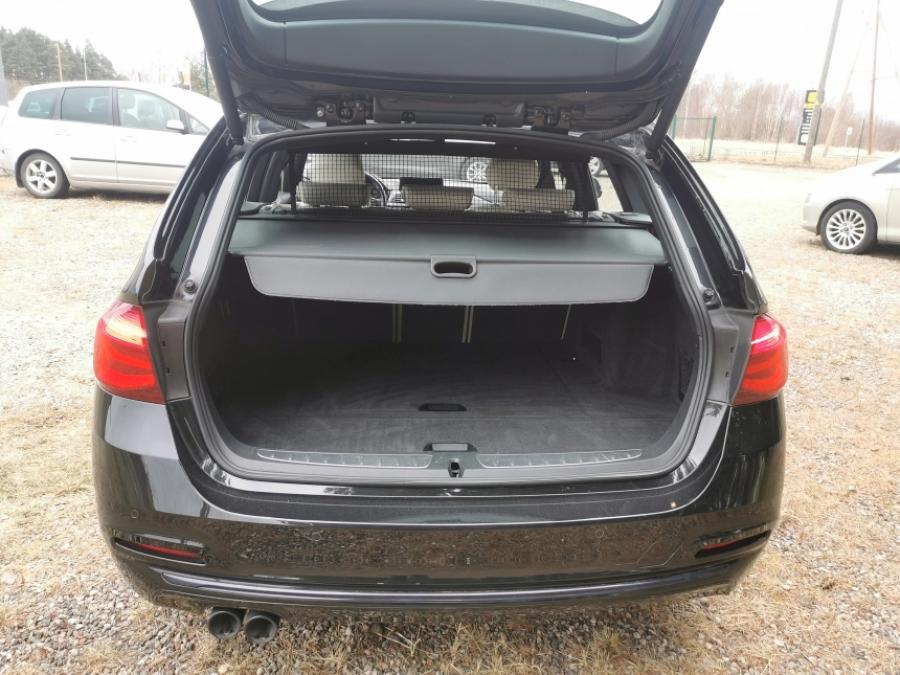 Black BMW 320 2018 in Riga, with an engine capacity of 2.00 L and mileage of 223 thousand km for 13900 €, photo 23 on AUTOMOTO.COM.LV