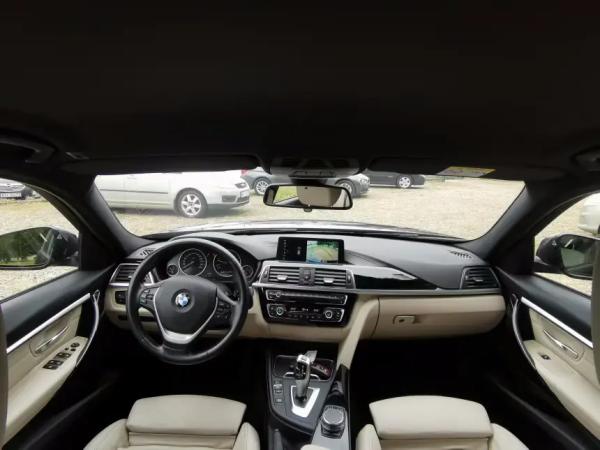 Black BMW 320 2018 in Kuldiga, with an engine capacity of 2.00 L and mileage of 223 thousand km for 13900 €, photo 6 on AUTOMOTO.COM.LV