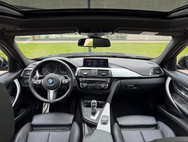 Black BMW 320 2018 in Riga, with an engine capacity of 2.00 L and mileage of 198 thousand km for 4900 €, photo 8 on AUTOMOTO.COM.LV