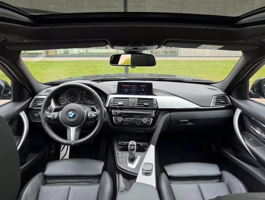 Black BMW 320 2018 in Riga, with an engine capacity of 2.00 L and mileage of 198 thousand km for 4900 €, photo 9 on AUTOMOTO.COM.LV