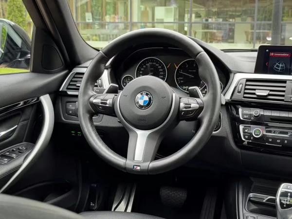 Black BMW 320 2018 in Riga, with an engine capacity of 2.00 L and mileage of 198 thousand km for 4900 €, photo 9 on AUTOMOTO.COM.LV