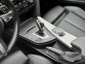 Black BMW 320 2018 in Riga, with an engine capacity of 2.00 L and mileage of 198 thousand km for 4900 €, photo 13 on AUTOMOTO.COM.LV