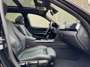 Black BMW 320 2018 in Riga, with an engine capacity of 2.00 L and mileage of 198 thousand km for 4900 €, photo 15 on AUTOMOTO.COM.LV