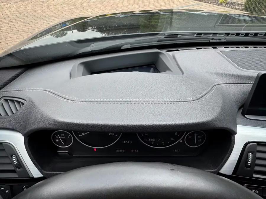 Black BMW 320 2018 in Riga, with an engine capacity of 2.00 L and mileage of 198 thousand km for 4900 €, photo 18 on AUTOMOTO.COM.LV