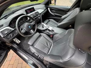 Black BMW 320 2018 in Riga, with an engine capacity of 2.00 L and mileage of 198 thousand km for 4900 €, photo 21 on AUTOMOTO.COM.LV