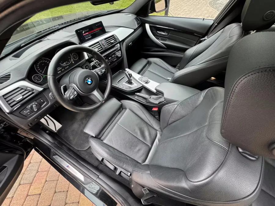 Black BMW 320 2018 in Riga, with an engine capacity of 2.00 L and mileage of 198 thousand km for 4900 €, photo 21 on AUTOMOTO.COM.LV