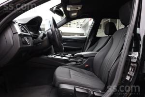 Black BMW 320 2018 in Riga, with an engine capacity of 2.00 L and mileage of 222 thousand km for 12495 €, photo 12 on AUTOMOTO.COM.LV