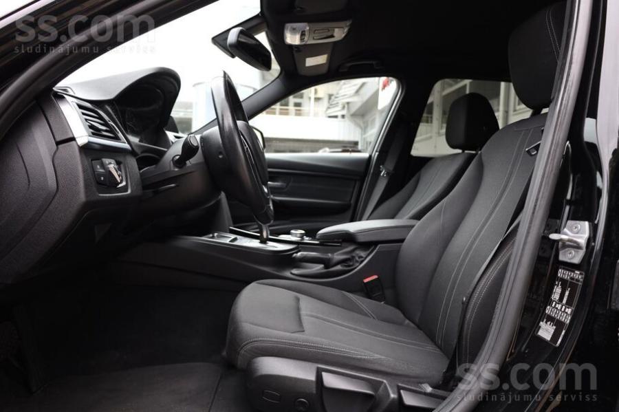 Black BMW 320 2018 in Riga, with an engine capacity of 2.00 L and mileage of 222 thousand km for 12495 €, photo 12 on AUTOMOTO.COM.LV