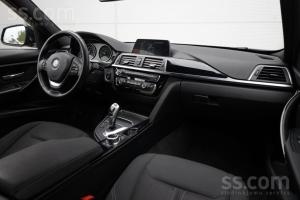 Black BMW 320 2018 in Riga, with an engine capacity of 2.00 L and mileage of 222 thousand km for 12495 €, photo 13 on AUTOMOTO.COM.LV