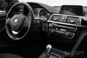 Black BMW 320 2018 in Riga, with an engine capacity of 2.00 L and mileage of 222 thousand km for 12495 €, photo 14 on AUTOMOTO.COM.LV