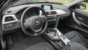 Black BMW 320 2018 in Riga, with an engine capacity of 2.00 L and mileage of 292 thousand km for 9950 €, photo 16 on AUTOMOTO.COM.LV