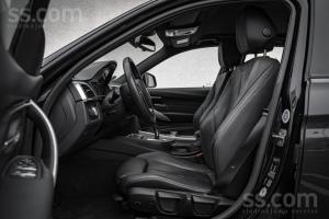 Black BMW 320 2018 in Riga, with an engine capacity of 2.00 L and mileage of 192 thousand km for 14995 €, photo 12 on AUTOMOTO.COM.LV