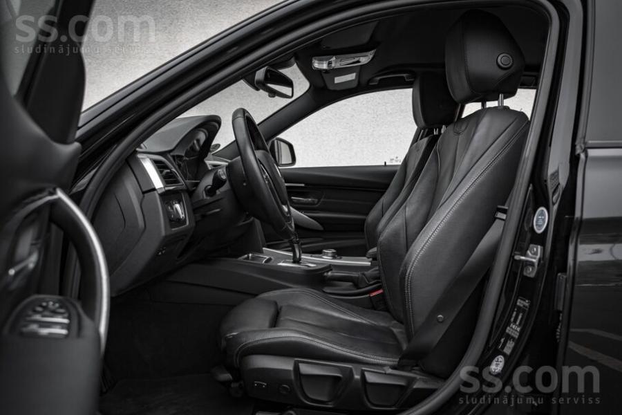 Black BMW 320 2018 in Riga, with an engine capacity of 2.00 L and mileage of 192 thousand km for 14995 €, photo 12 on AUTOMOTO.COM.LV
