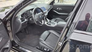 Black BMW 320 2019 in Riga, with an engine capacity of 2.00 L and mileage of 192 thousand km for 18500 €, photo 6 on AUTOMOTO.COM.LV