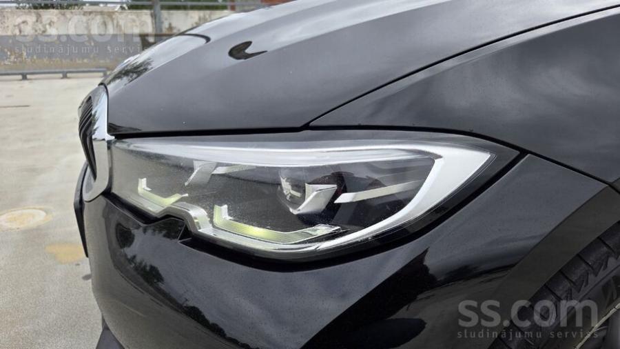 Black BMW 320 2019 in Riga, with an engine capacity of 2.00 L and mileage of 192 thousand km for 18500 €, photo 14 on AUTOMOTO.COM.LV