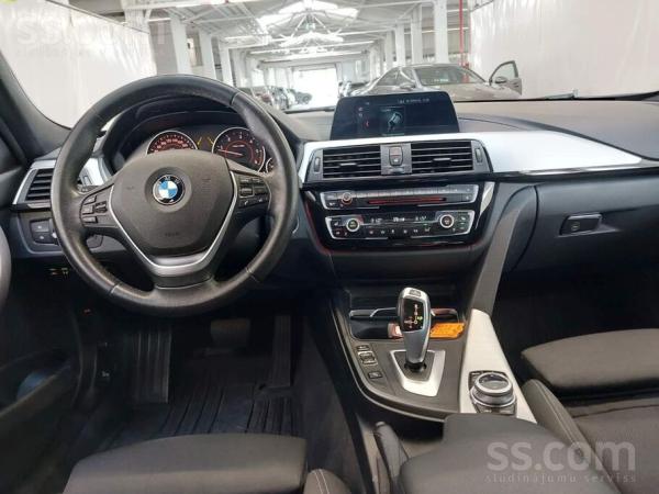 Black BMW 320 2019 in Riga, with an engine capacity of 2.00 L and mileage of 228 thousand km for 12999 €, photo 5 on AUTOMOTO.COM.LV