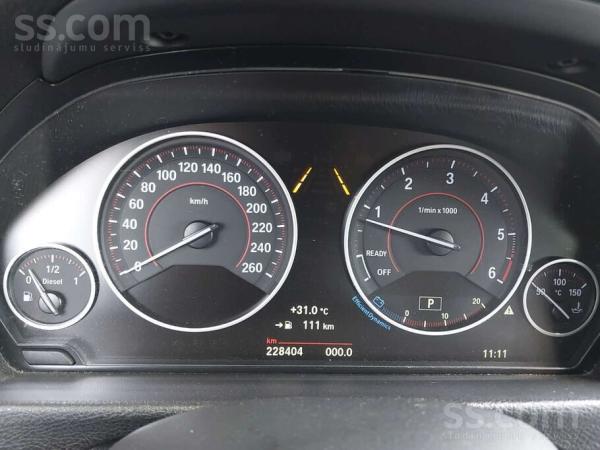 Black BMW 320 2019 in Riga, with an engine capacity of 2.00 L and mileage of 228 thousand km for 12999 €, photo 9 on AUTOMOTO.COM.LV