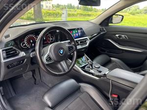 Black BMW 320 2019 in Ogre, with an engine capacity of 2.00 L and mileage of 371 thousand km for 15799 €, photo 8 on AUTOMOTO.COM.LV