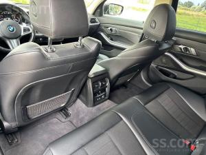 Black BMW 320 2019 in Ogre, with an engine capacity of 2.00 L and mileage of 371 thousand km for 15799 €, photo 11 on AUTOMOTO.COM.LV