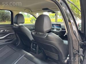 Black BMW 320 2019 in Ogre, with an engine capacity of 2.00 L and mileage of 371 thousand km for 15799 €, photo 12 on AUTOMOTO.COM.LV