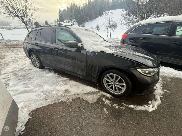 Black BMW 320 2020 in Marijampole, with an engine capacity of 2.00 L and mileage of 50 thousand km for 13950 €, photo 1 on AUTOMOTO.COM.LV