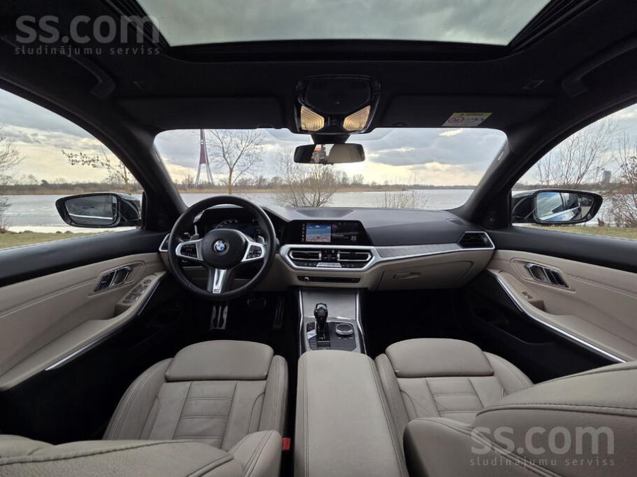 Black BMW 320 2020 in Riga, with an engine capacity of 2.00 L and mileage of 208 thousand km for 17990 €, photo 6 on AUTOMOTO.COM.LV