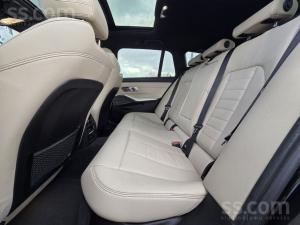Black BMW 320 2020 in Riga, with an engine capacity of 2.00 L and mileage of 208 thousand km for 17990 €, photo 12 on AUTOMOTO.COM.LV