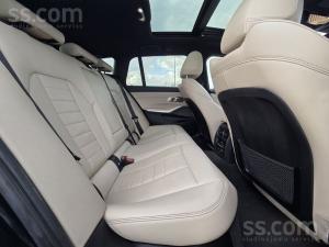 Black BMW 320 2020 in Riga, with an engine capacity of 2.00 L and mileage of 208 thousand km for 17990 €, photo 13 on AUTOMOTO.COM.LV