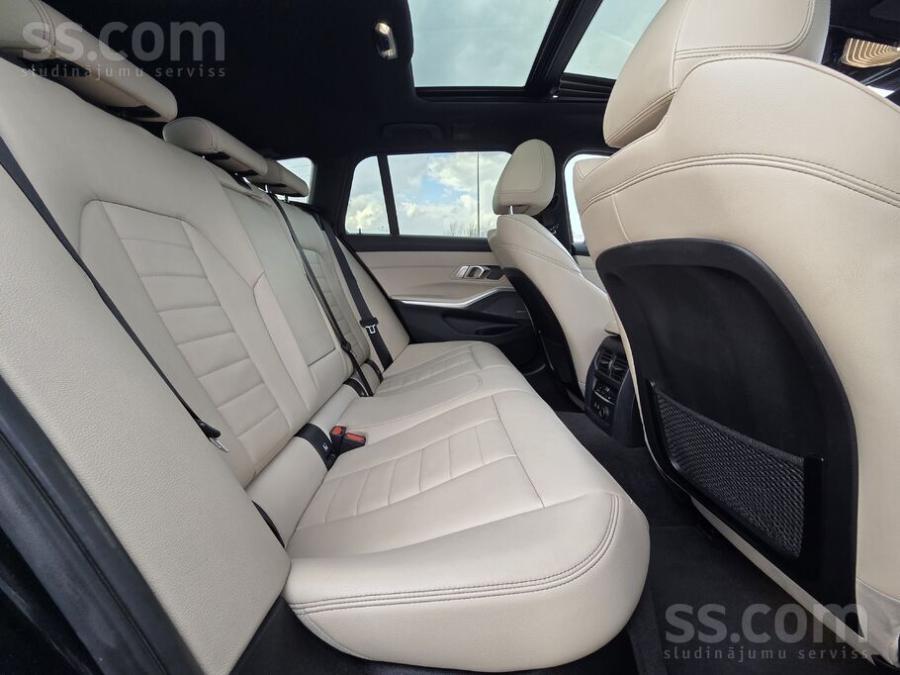 Black BMW 320 2020 in Riga, with an engine capacity of 2.00 L and mileage of 208 thousand km for 17990 €, photo 13 on AUTOMOTO.COM.LV