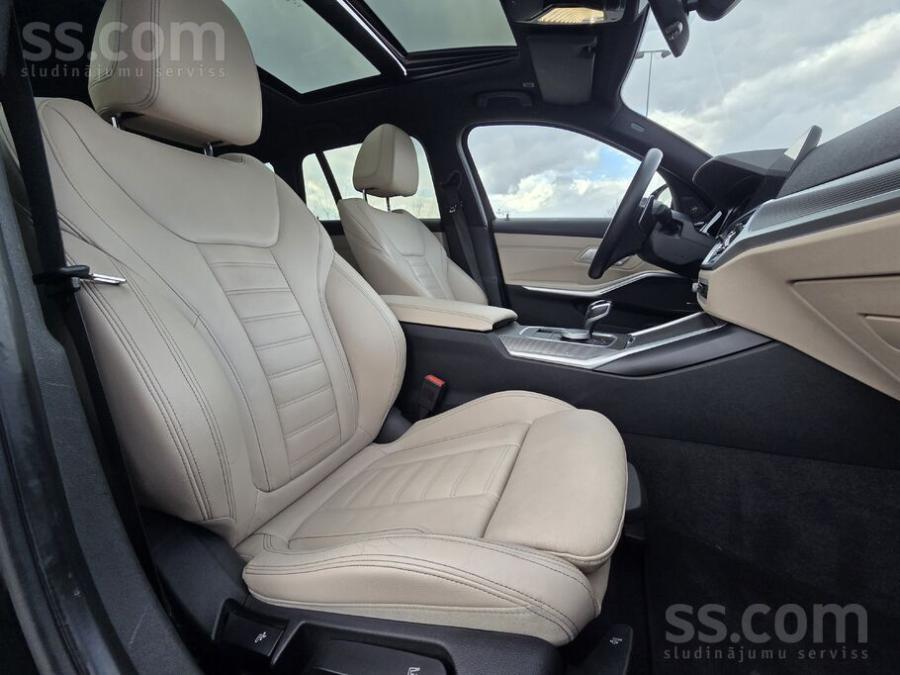 Black BMW 320 2020 in Riga, with an engine capacity of 2.00 L and mileage of 208 thousand km for 17990 €, photo 14 on AUTOMOTO.COM.LV