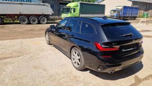 Black BMW 320 2020 in Kaunas, with an engine capacity of 2.00 L and mileage of 114 thousand km for 22990 €, photo 5 on AUTOMOTO.COM.LV