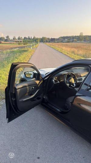 Black BMW 320 2020 in Panevezys, with an engine capacity of 2.00 L and mileage of 260 thousand km for 16499 €, photo 17 on AUTOMOTO.COM.LV