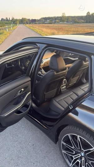 Black BMW 320 2020 in Panevezys, with an engine capacity of 2.00 L and mileage of 260 thousand km for 16499 €, photo 21 on AUTOMOTO.COM.LV