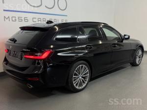 Black BMW 320 2021 in Riga, with an engine capacity of 2.00 L and mileage of 194 thousand km for 20900 €, photo 5 on AUTOMOTO.COM.LV