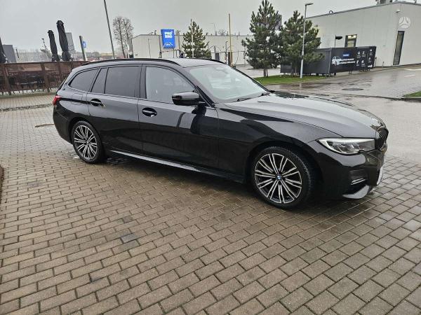 Black BMW 320 2021 in Kaunas, with an engine capacity of 2.00 L and mileage of 149 thousand km for 23600 €, photo 1 on AUTOMOTO.COM.LV