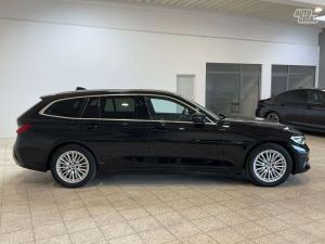 Black BMW 320 2021 in Kaunas, with an engine capacity of 2.00 L and mileage of 98 thousand km for 28496 €, photo 8 on AUTOMOTO.COM.LV