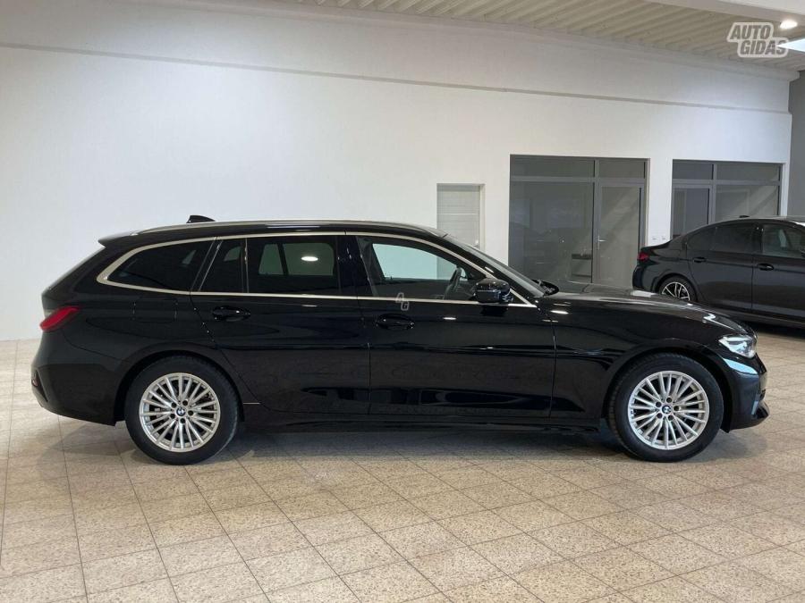 Black BMW 320 2021 in Kaunas, with an engine capacity of 2.00 L and mileage of 98 thousand km for 28496 €, photo 8 on AUTOMOTO.COM.LV