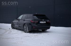 Black BMW 320 2021 in Riga, with an engine capacity of 2.00 L and mileage of 143 thousand km for 23495 €, photo 3 on AUTOMOTO.COM.LV