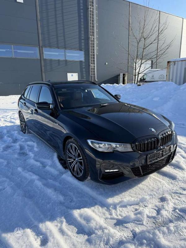 Black BMW 320 2021 in Panevezys, with an engine capacity of 2.00 L and mileage of 215 thousand km for 20500 €, photo 1 on AUTOMOTO.COM.LV