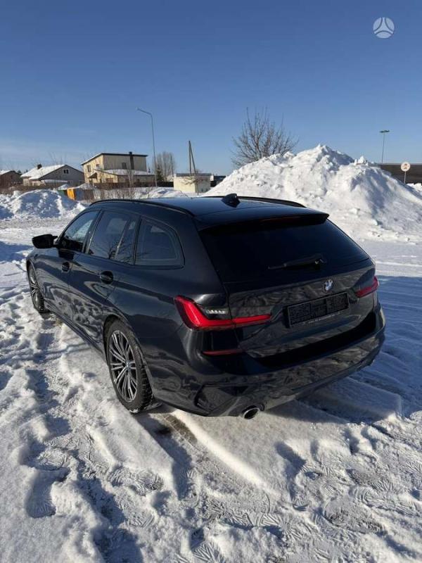 Black BMW 320 2021 in Panevezys, with an engine capacity of 2.00 L and mileage of 215 thousand km for 20500 €, photo 6 on AUTOMOTO.COM.LV