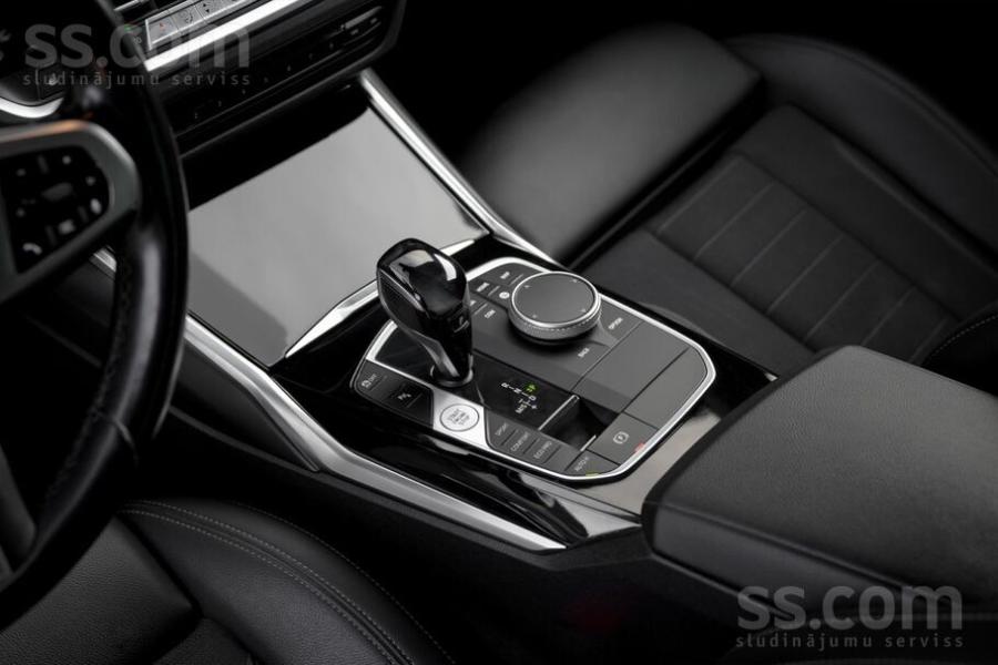 Black BMW 320 2021 in Talsi, with an engine capacity of 2.00 L and mileage of 220 thousand km for 17750 €, photo 26 on AUTOMOTO.COM.LV