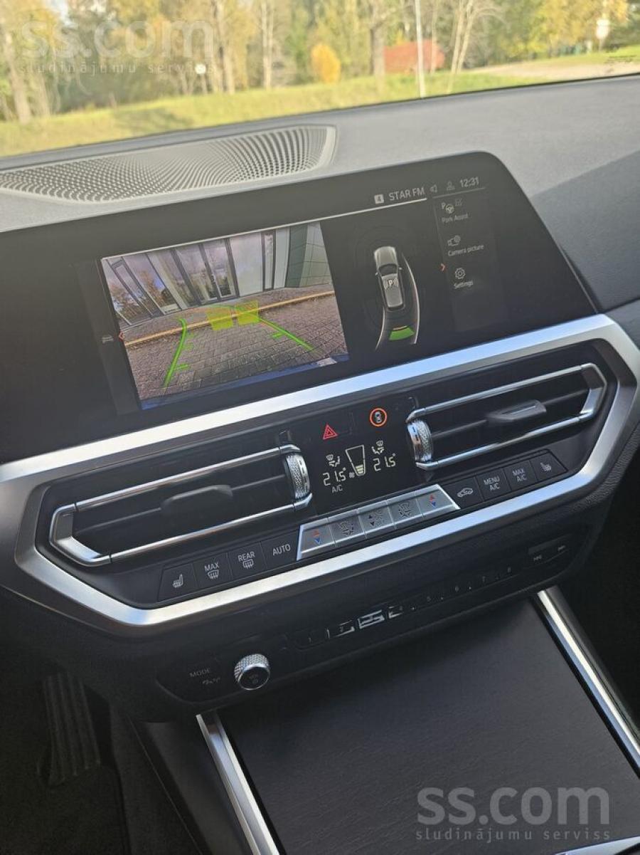 Black BMW 320 2021 in Tukums, with an engine capacity of 2.00 L and mileage of 161 thousand km for 22500 €, photo 21 on AUTOMOTO.COM.LV