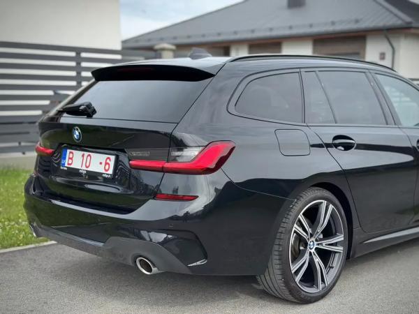 Black BMW 320 2021 in Jelgava, with an engine capacity of 2.00 L and mileage of 220 thousand km for 21800 €, photo 6 on AUTOMOTO.COM.LV