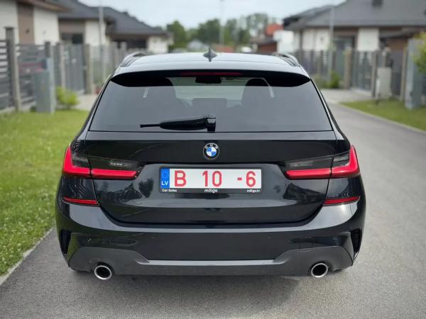 Black BMW 320 2021 in Jelgava, with an engine capacity of 2.00 L and mileage of 220 thousand km for 21800 €, photo 8 on AUTOMOTO.COM.LV