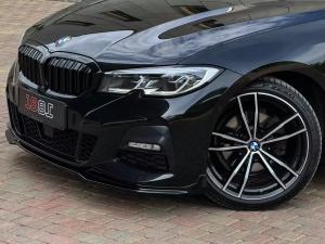Black BMW 320 2021 in Riga, with an engine capacity of 2.00 L and mileage of 158 thousand km for 21900 €, photo 5 on AUTOMOTO.COM.LV