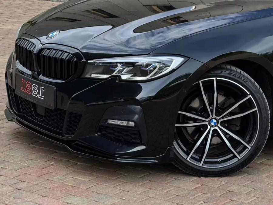 Black BMW 320 2021 in Riga, with an engine capacity of 2.00 L and mileage of 158 thousand km for 21900 €, photo 5 on AUTOMOTO.COM.LV